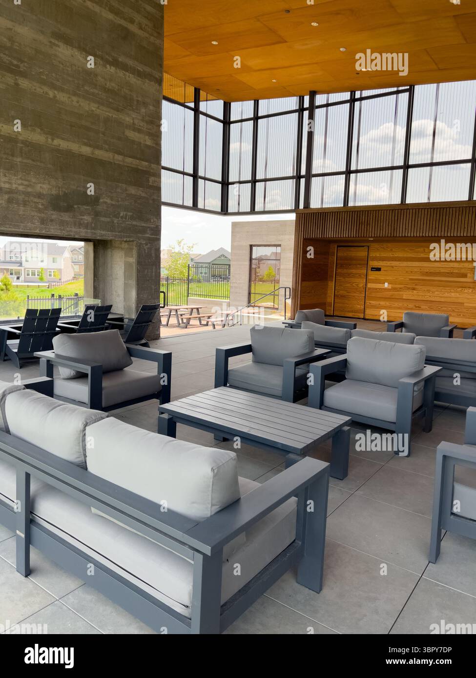 Modern Community Lounge with Outdoor Seating and Fireplace Stock Photo ...