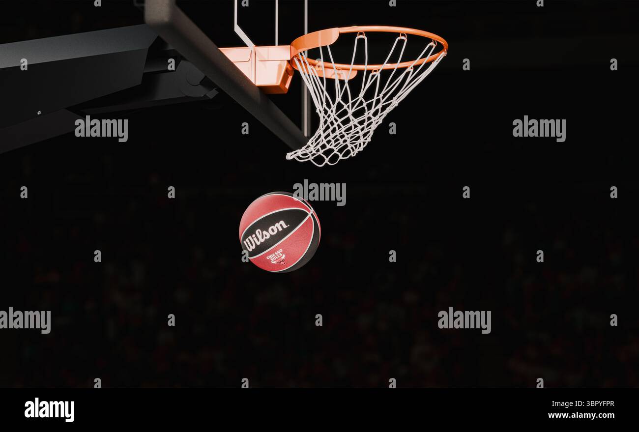 A Chicago Bulls Branded Wilson Basketball Flying Through a Hoop at an ...