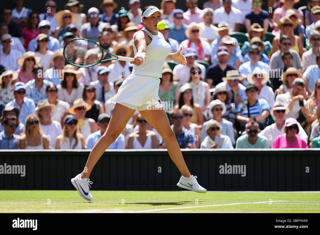 Amanda Anisimova of the U.S. returns the ball to Aryna Sabalenka of Belarus during the women's ...