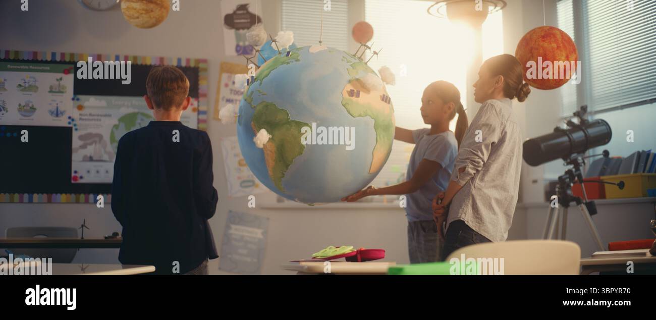 Female teacher educating smart kids hi-res stock photography and images ...