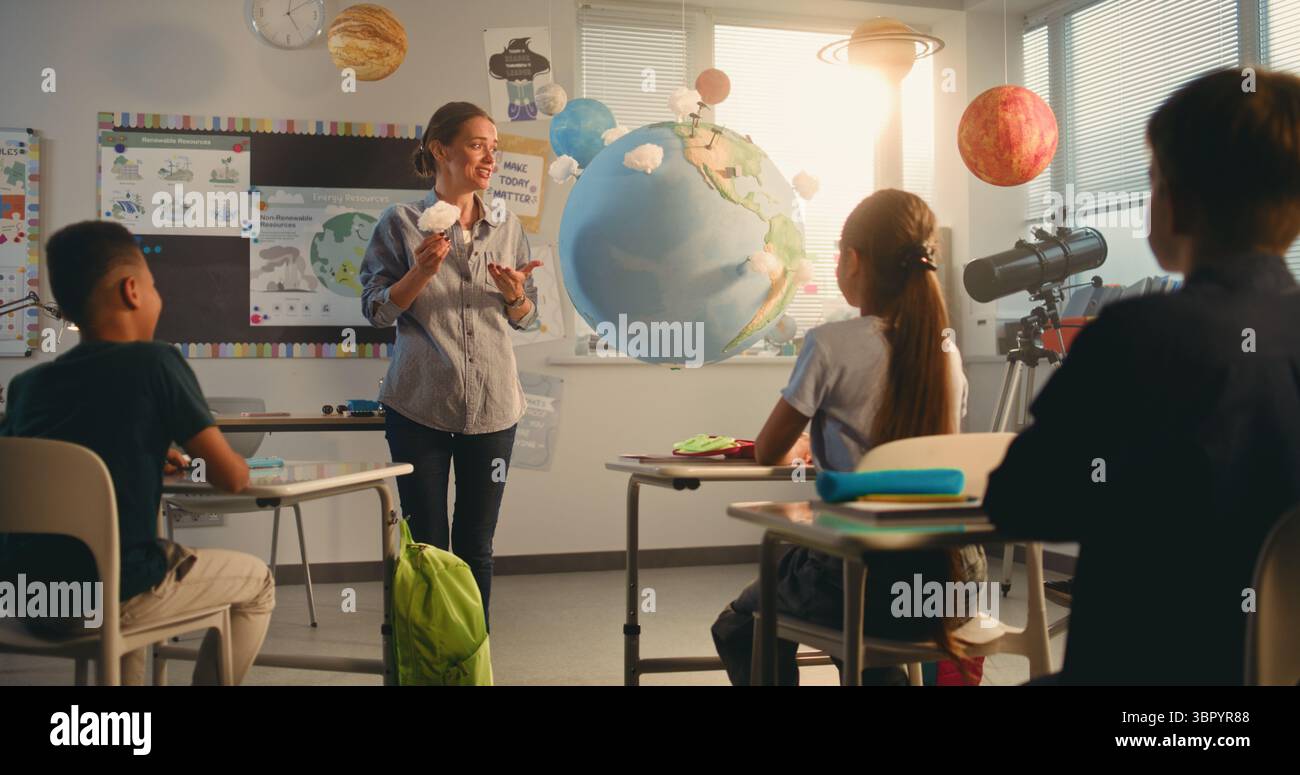 Female Teacher Educating Smart Kids During Science Lesson in ...