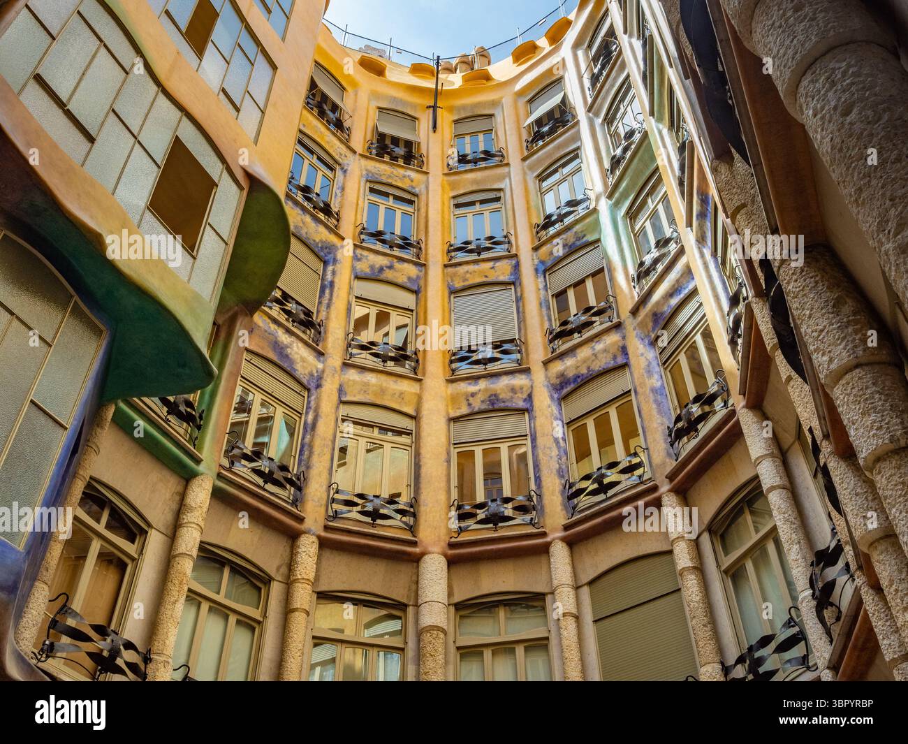 The colourful interior courtyard of Casa Milà (La Pedrera), an ...