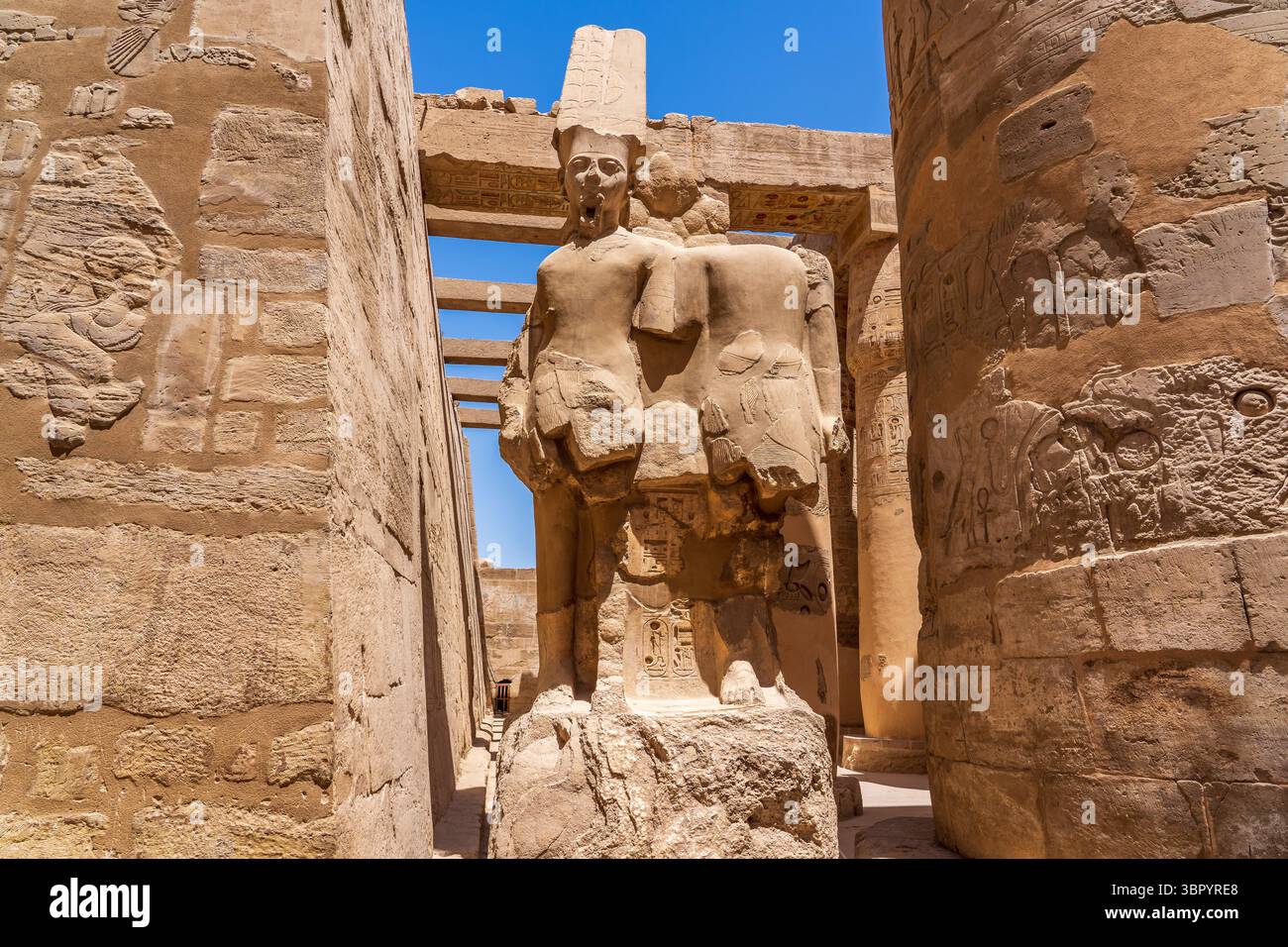 Statue of Amun Ra in the Temple of Karnak, Luxor Stock Photo - Alamy
