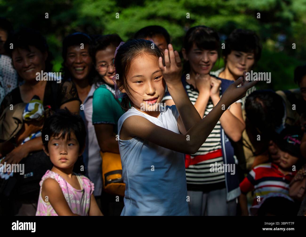 North Korean girl dancing in a park on september 9, DGC, Pyongyang ...