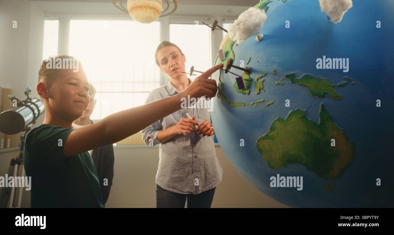 STEM Science Lesson: African American Boy Presenting Renewable Energy ...