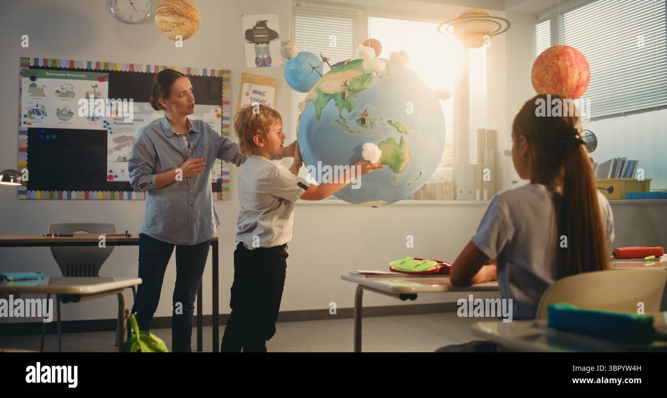 Female Teacher Educating Smart Kids During Science Lesson in Modern ...
