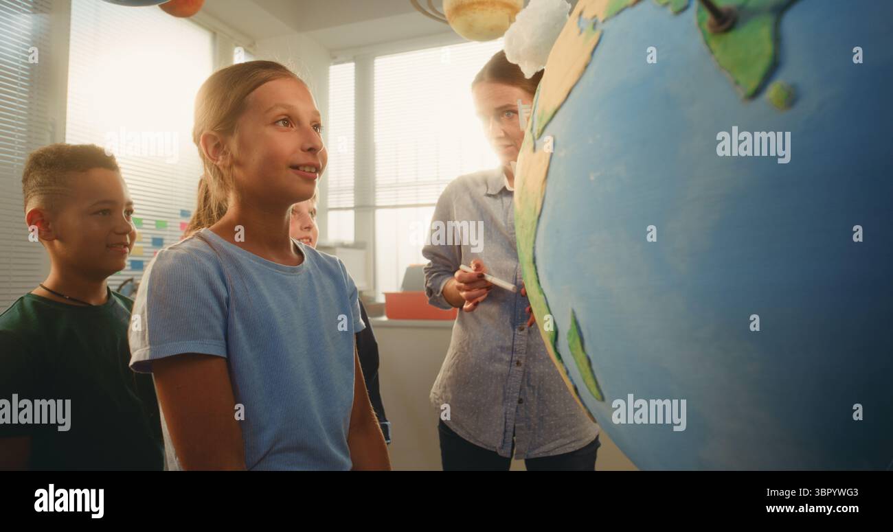 STEM Science Lesson: Smart School Girl Presenting Renewable Energy ...