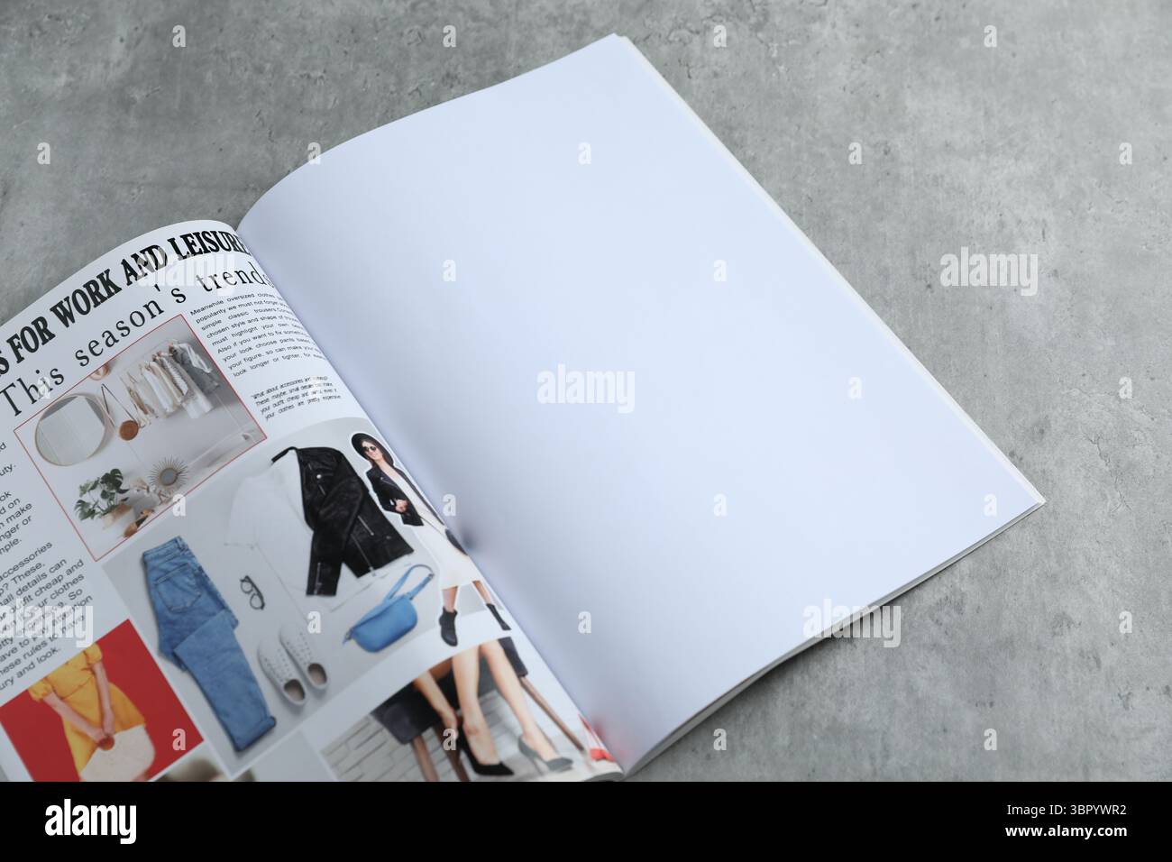 Open magazine on grey table, above view. Mockup for design Stock Photo ...