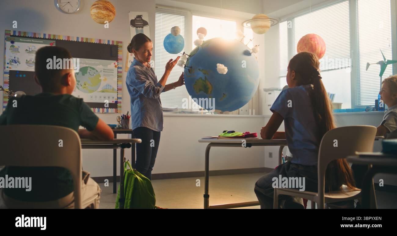 STEM Class on Renewable Energy: Female Teacher Explaining Energy ...