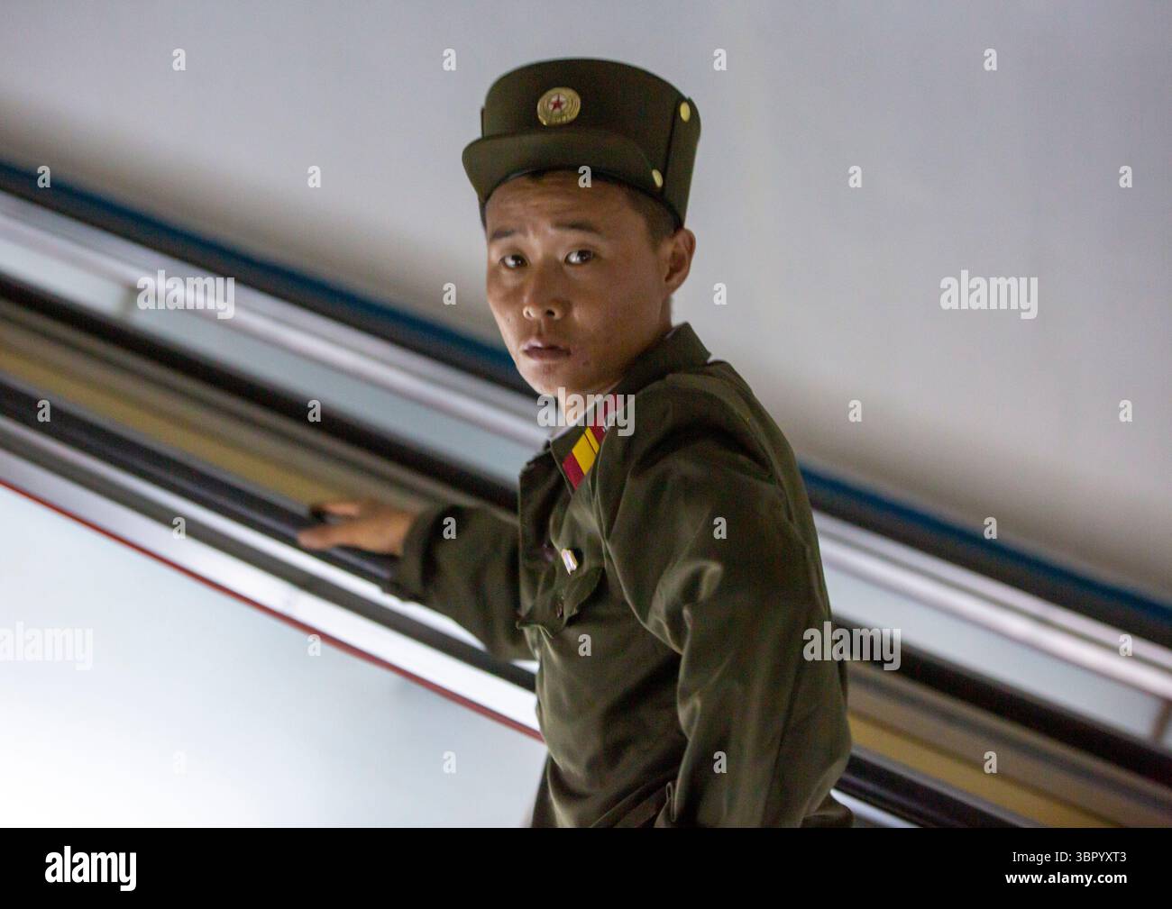 North Korean soldier using escalator leading to the subway station, DGC ...