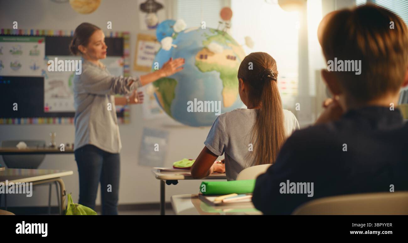 STEM Class on Renewable Energy: Female Teacher Explaining Energy ...