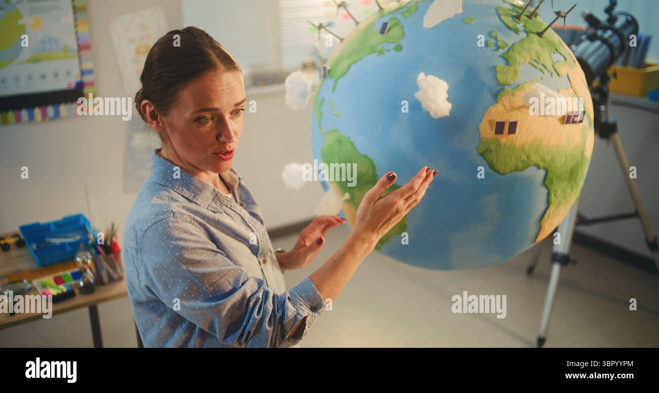 STEM Class: Female School Teacher Educating Science and Renewable ...