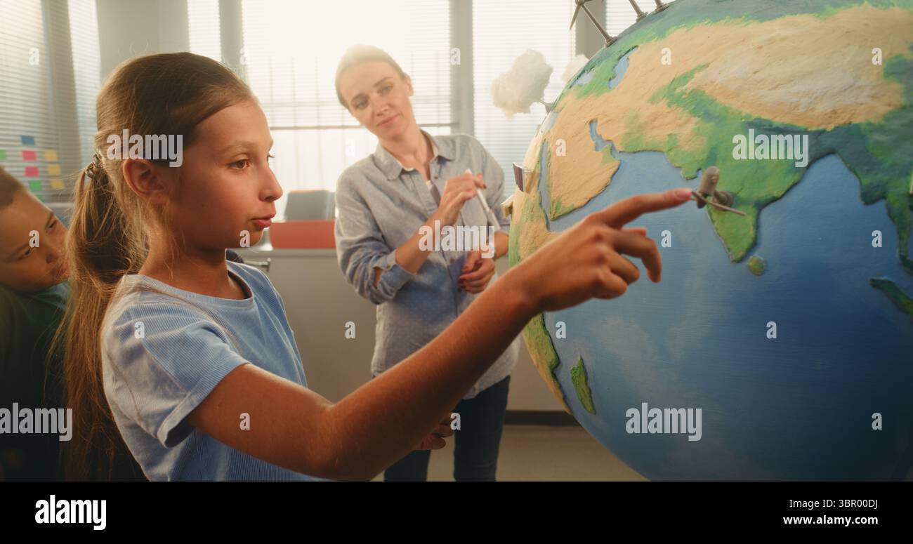STEM Science Lesson: Smart School Girl Presenting Renewable Energy ...