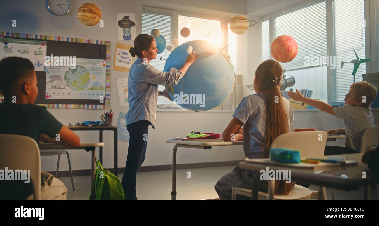 Science Lesson: Female Teacher Educating Smart Kids Using Earth Model ...