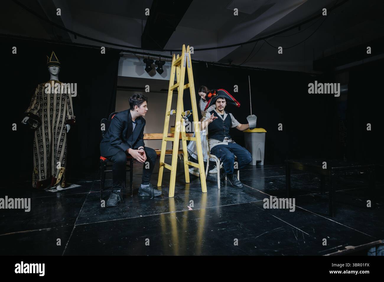Theatrical performance with actors and dramatic costumes featuring a ...