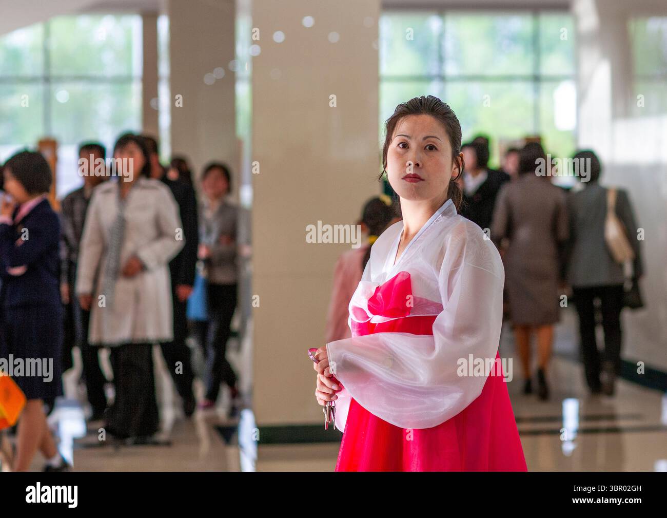 North Korean woman in traditional choson-ot in opera lobby, DGC ...