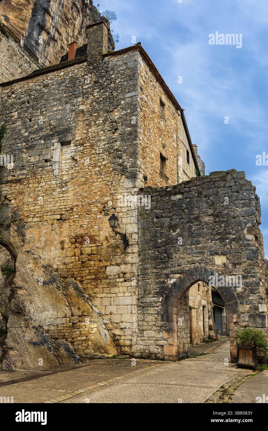 Remains of the old medieval fortification wall with the Porte Hugon ...