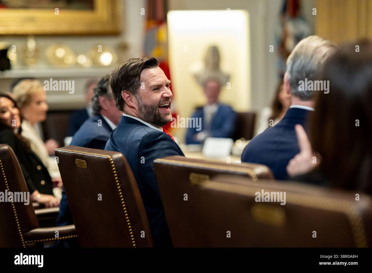 Vice President JD Vance shares a laugh during a Cabinet meeting led by ...