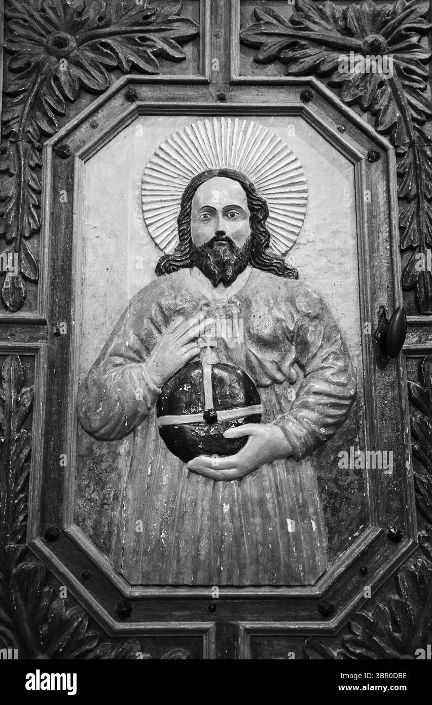 AVRIEUX, FRANCE - AUGUST 11, 2016: Door carving depicting Christ with ...