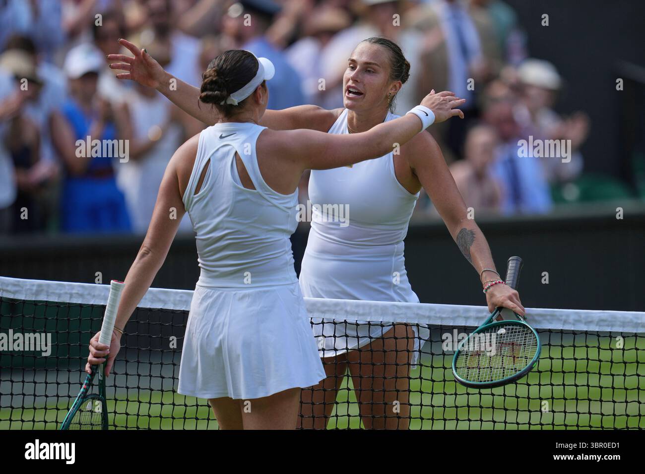 Amanda Anisimova of the U.S. greets Aryna Sabalenka of Belarus after beating her in a women's ...