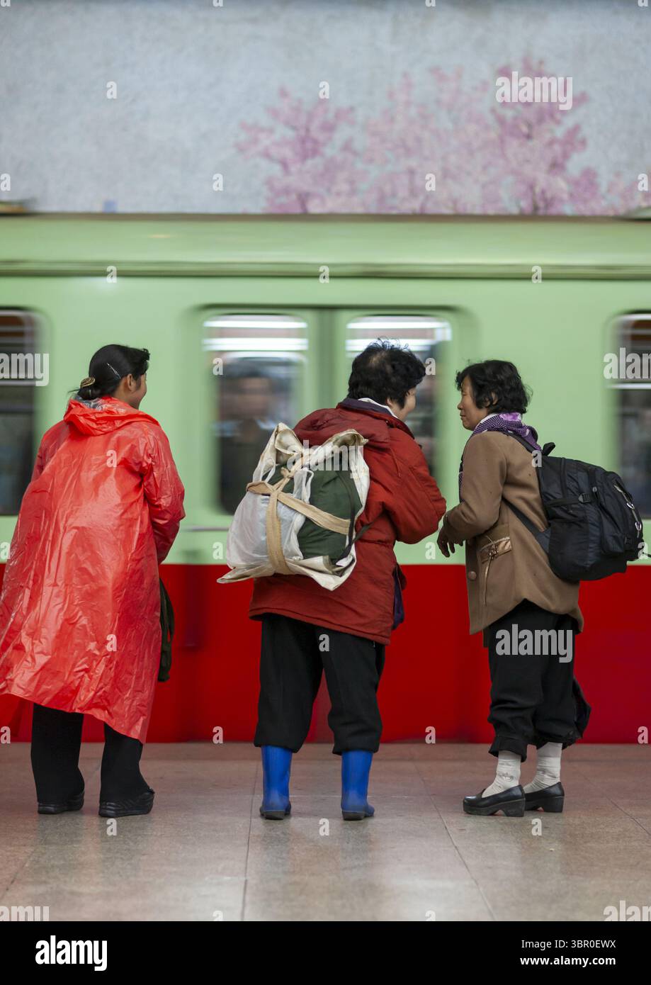 North Korean woman waiting in puhung metro station, DGC, Pyongyang ...