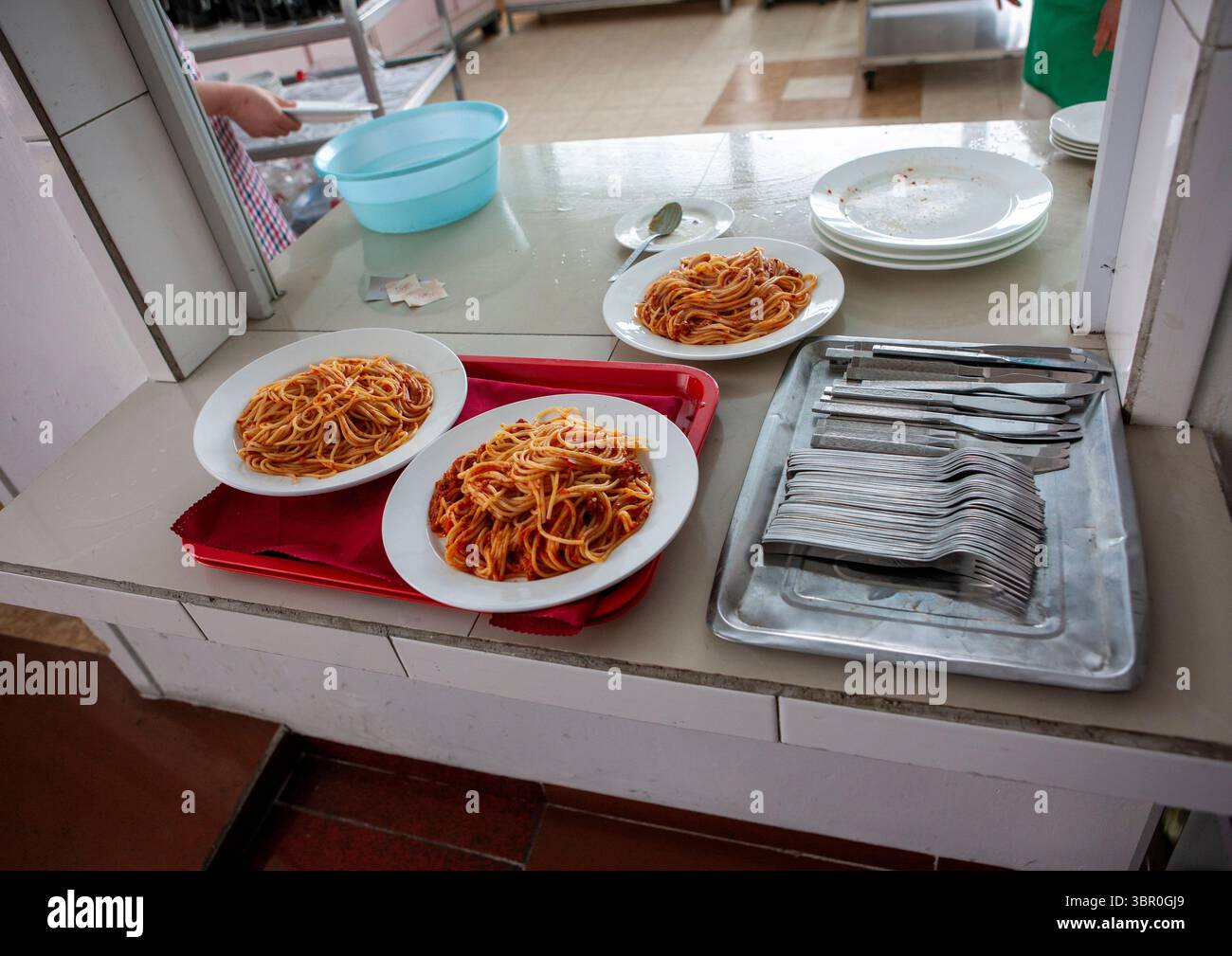 Spaghetti plates in an italian restaurant, DGC, Pyongyang, North Korea ...