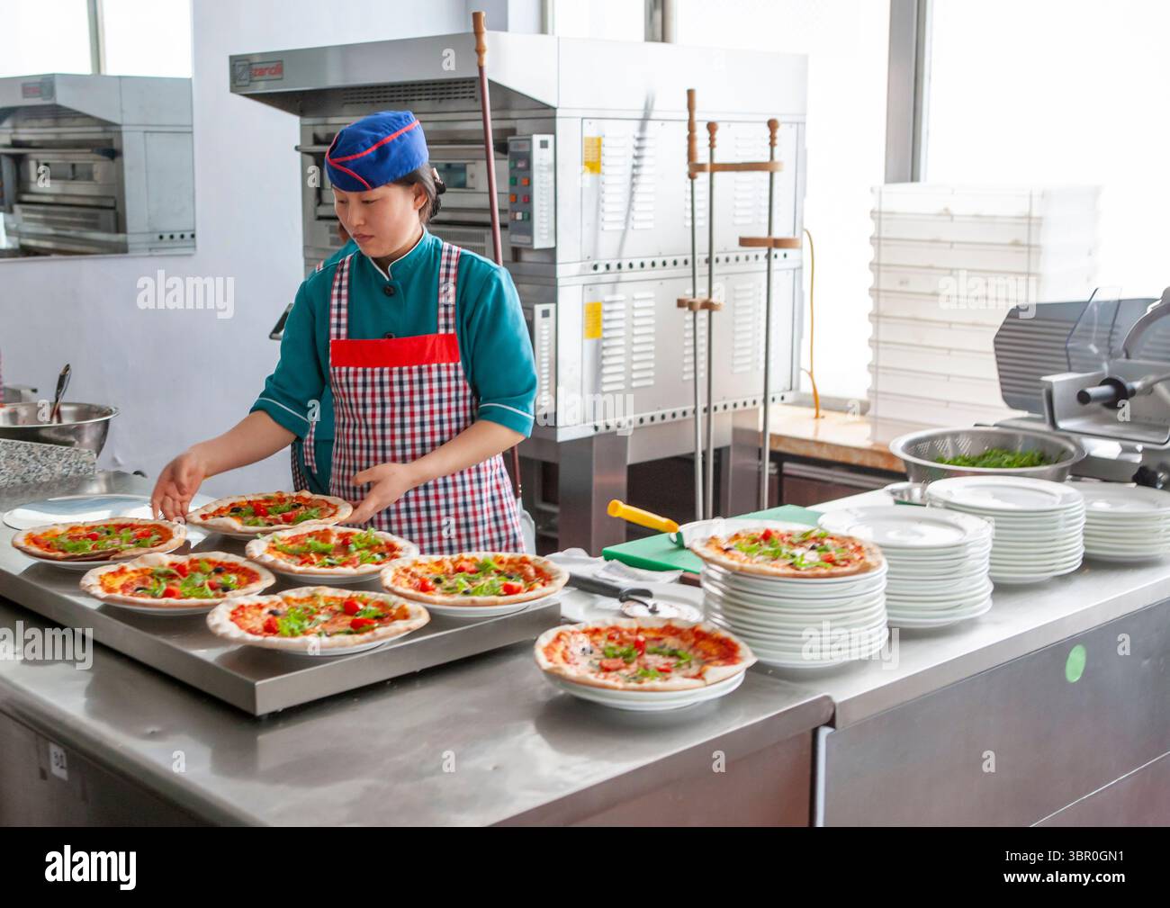 North Korean pizzeria cooks in an italian restaurant, DGC, Pyongyang ...