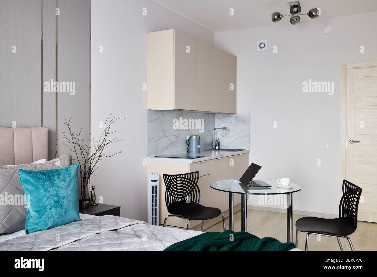 This is a modern and cozy studio apartment that features a wellequipped ...