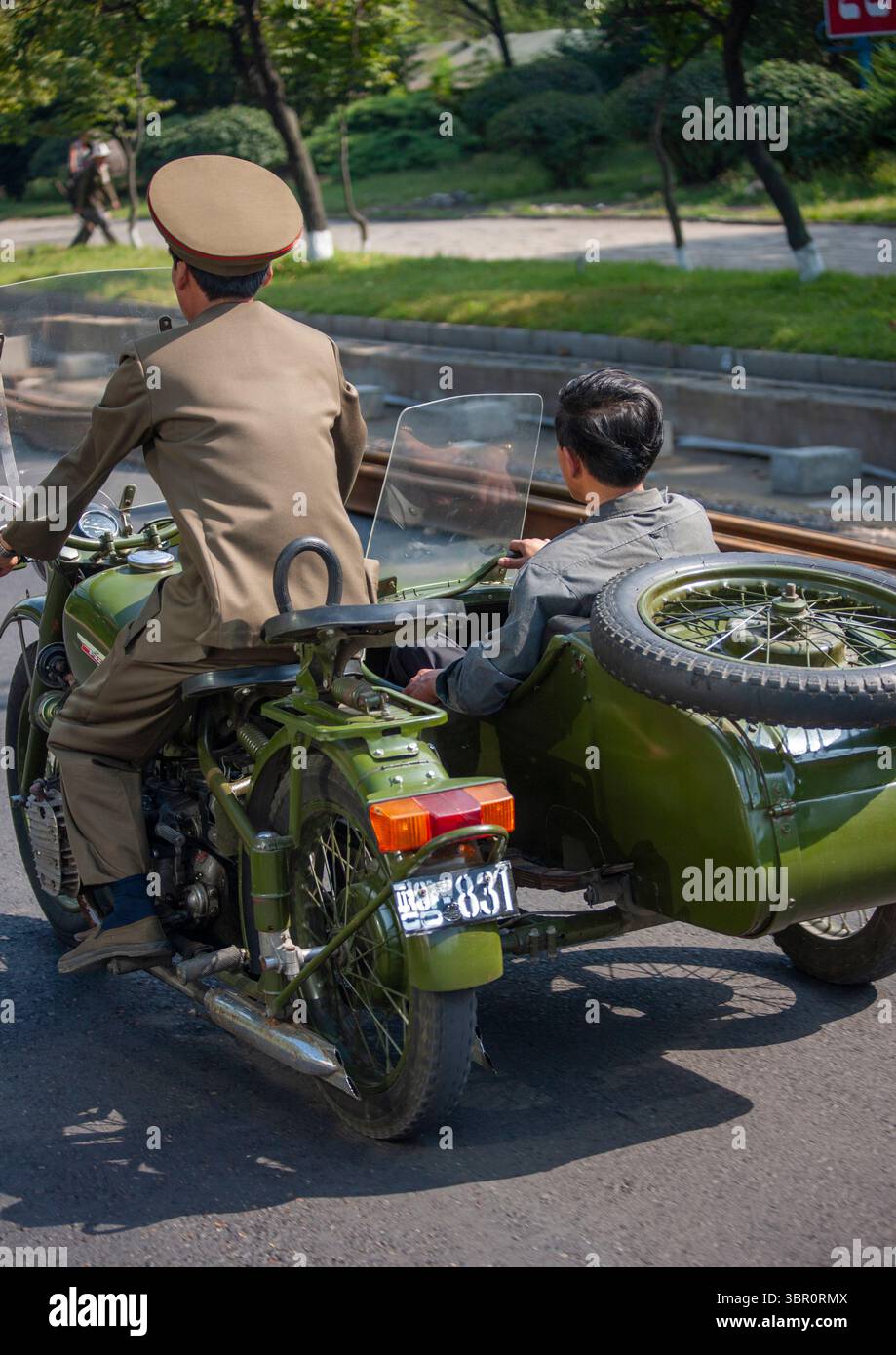 North korean soldiers on a side car in the city, DGC, Pyongyang, North ...