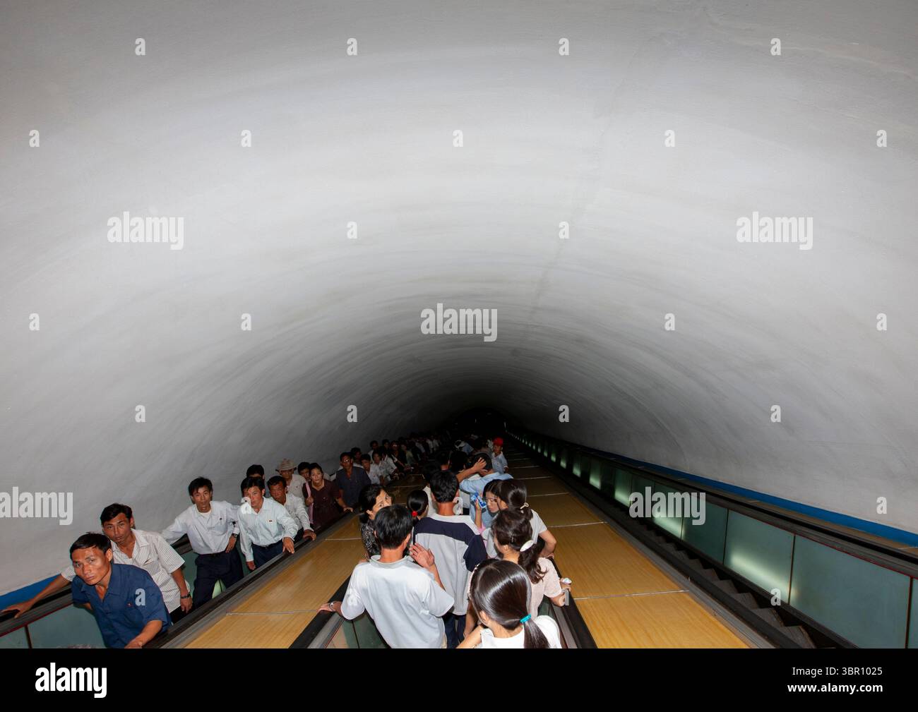 North Korean people using escalator leading to the subway station, DGC ...
