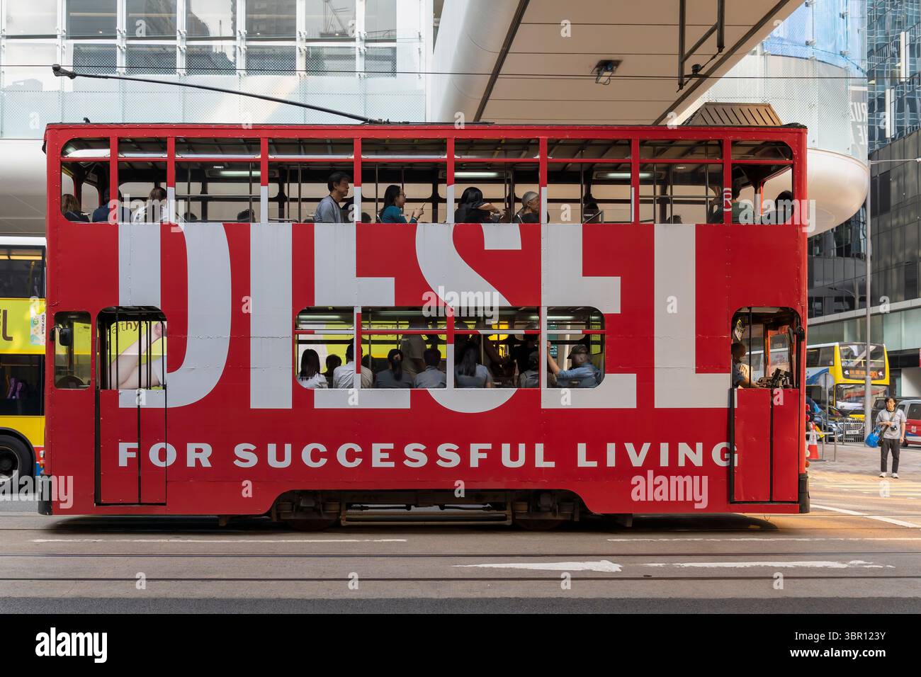Hong Kong historic double-decker Ding Ding tram. Diesel fashion label ...