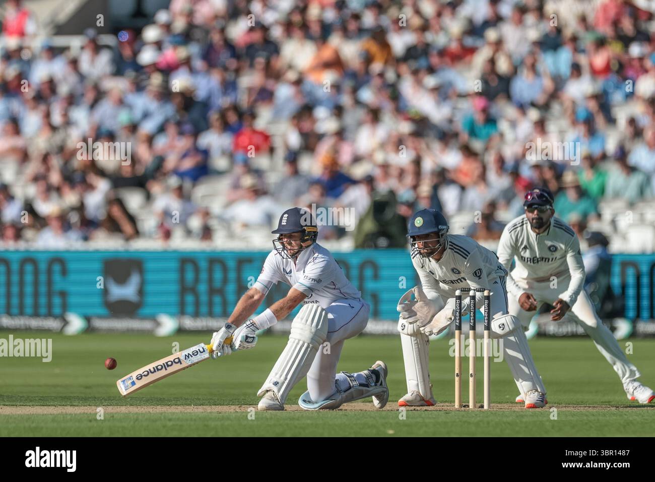 Joe Root of England with a reverse sweep that takes him to 90 runs ...