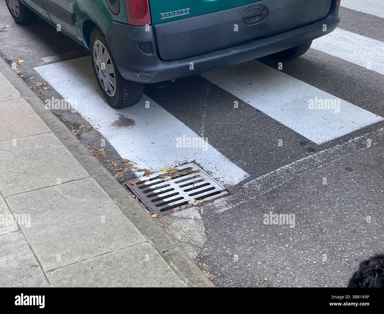 Cremona, Italy June 8th 2025 Green Renault Scenic improperly parked ...