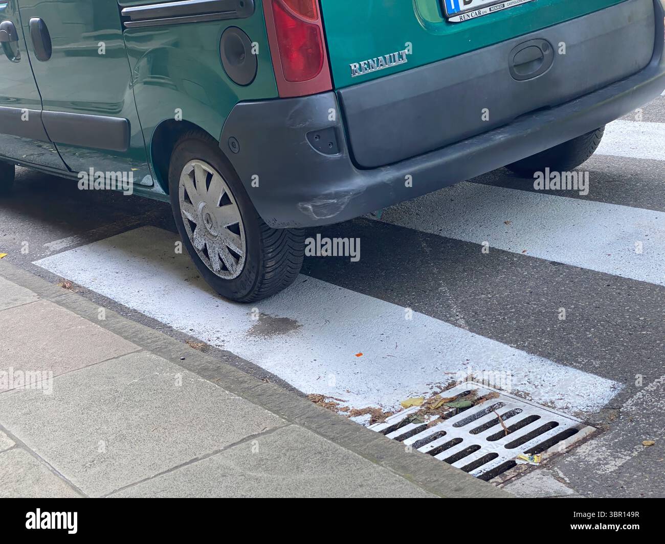 Cremona, Italy June 8th 2025 Green Renault Scenic improperly parked ...