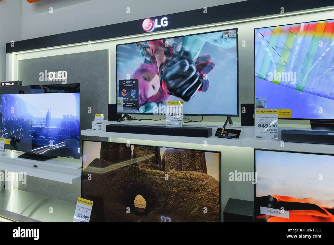 Almaty, Kazakhstan - July 04, 2025: Showcase with LG TVs in the store. Modern LED display Stock ...