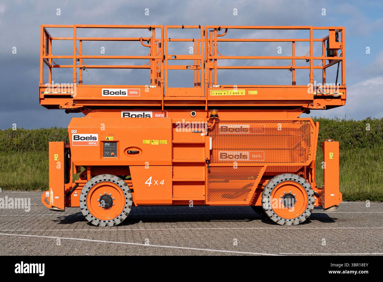 Boels rental scissor lift Stock Photo - Alamy