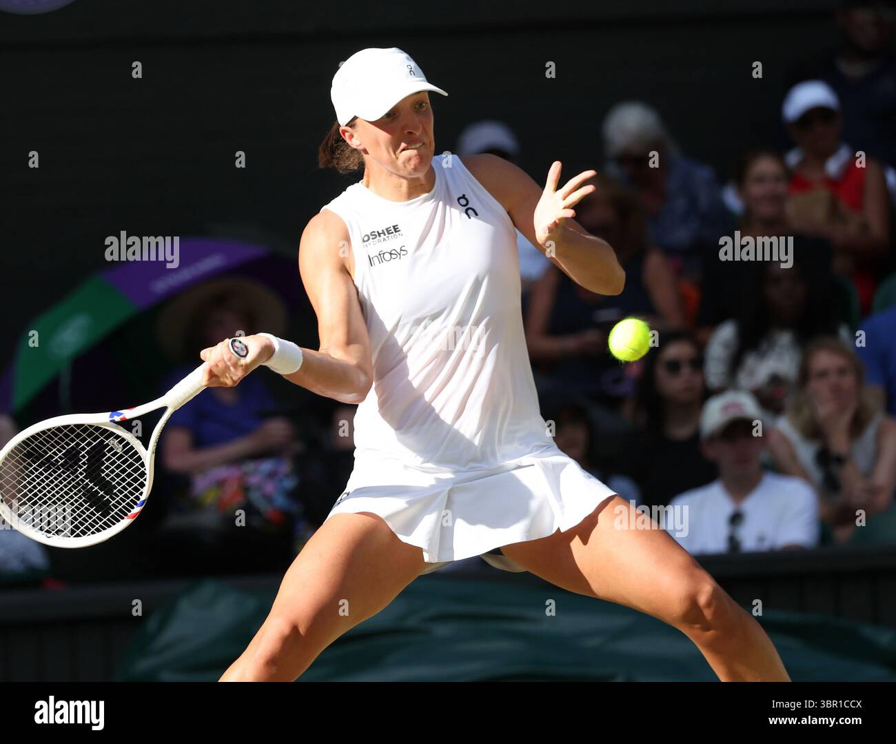 Poland's Iga Swiatek plays a forehand in her Semi-Final match against ...
