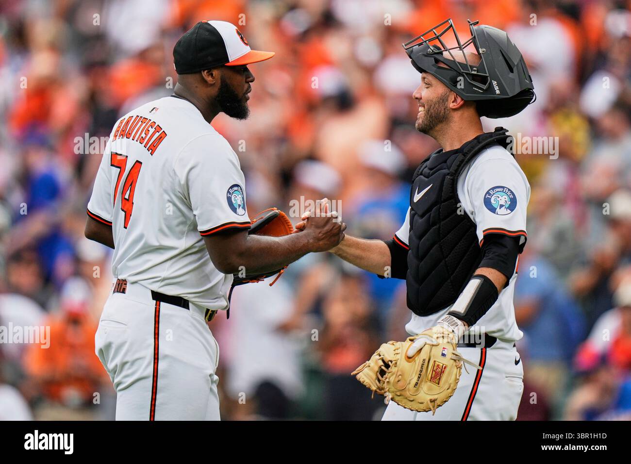 Baltimore Orioles relief pitcher Felix Bautista (74) and catcher Jacob ...