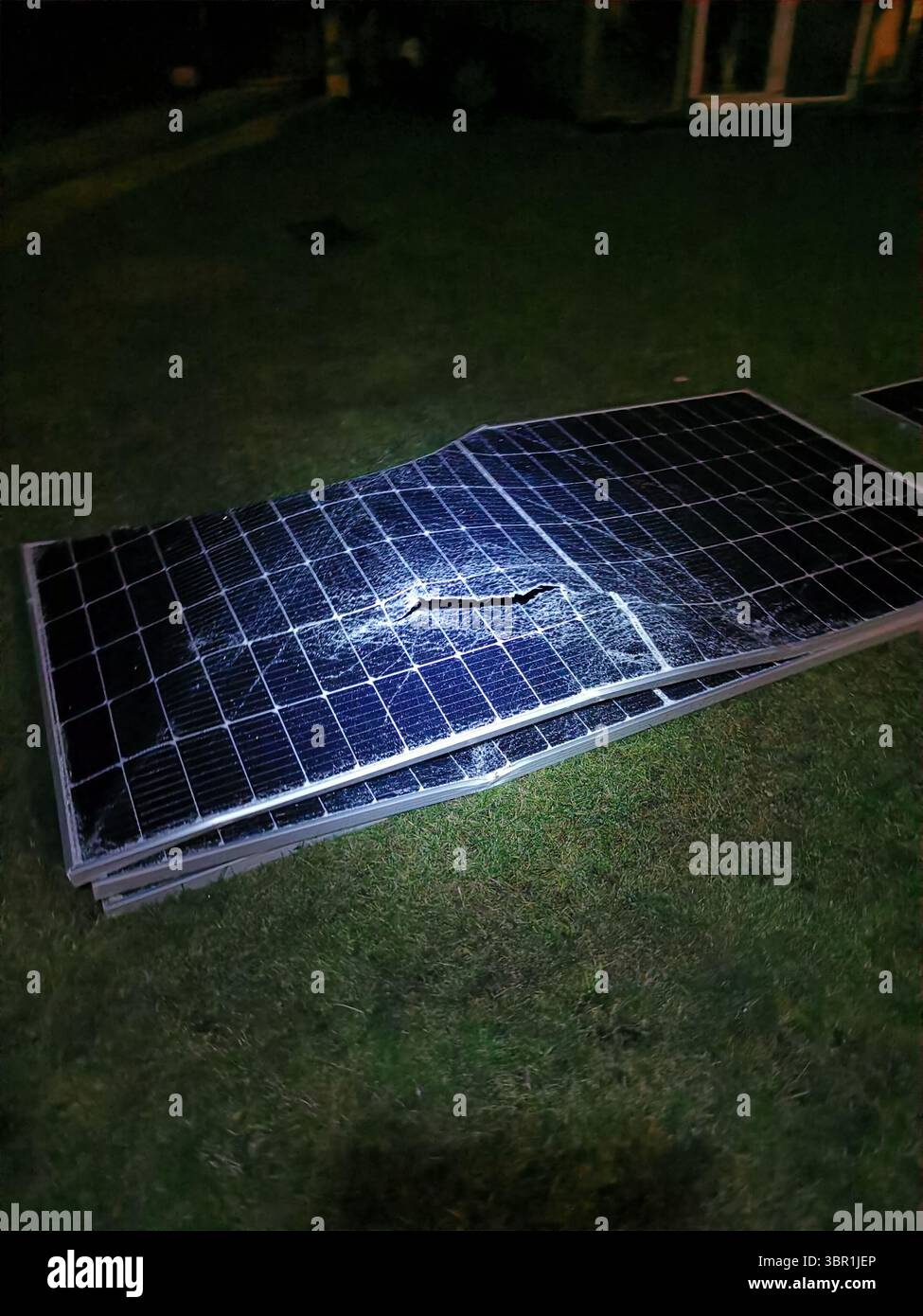Broken solar panels torn off the roof after the storm Stock Photo - Alamy