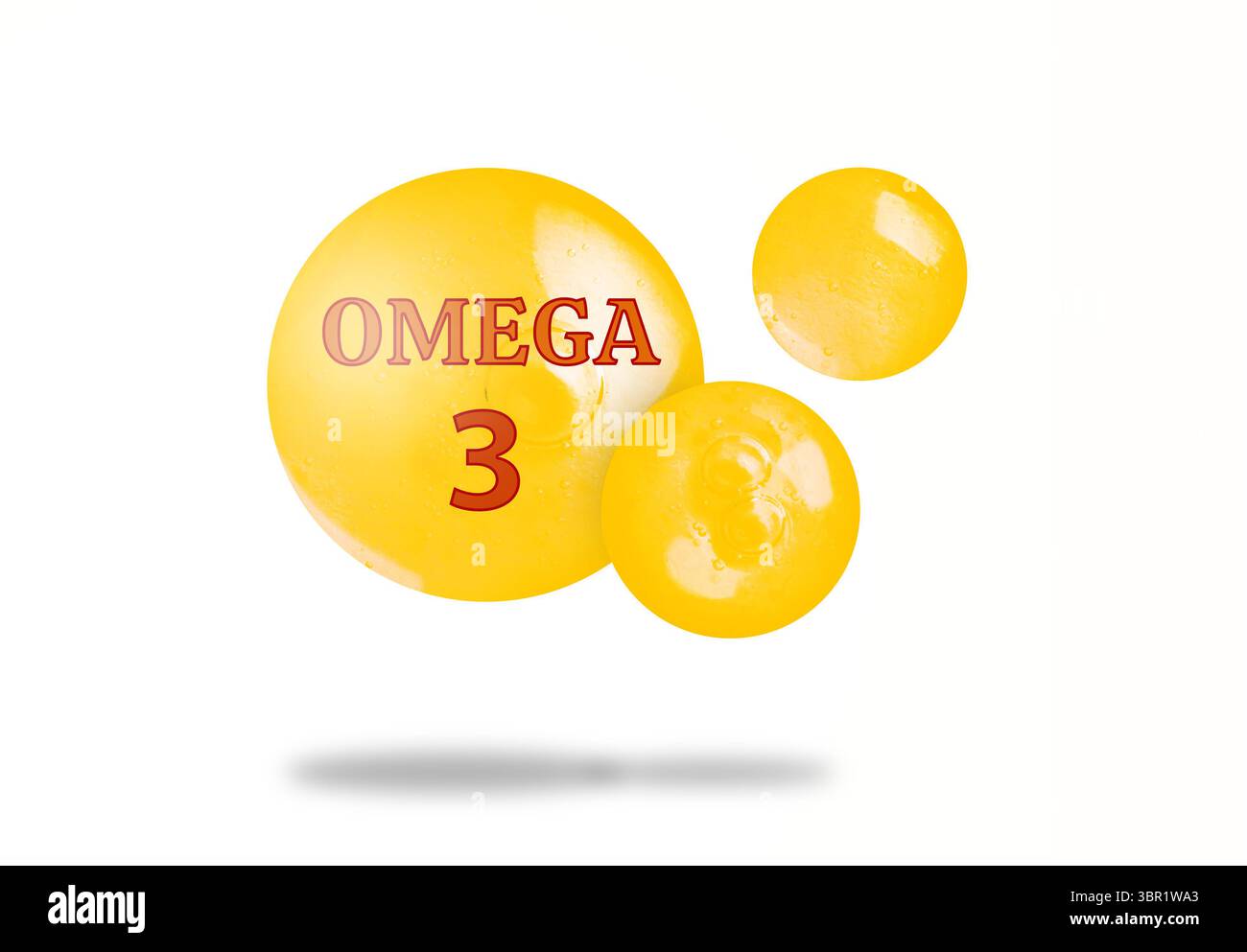 Yellow drops of Omega-3 in air on white background Stock Photo - Alamy