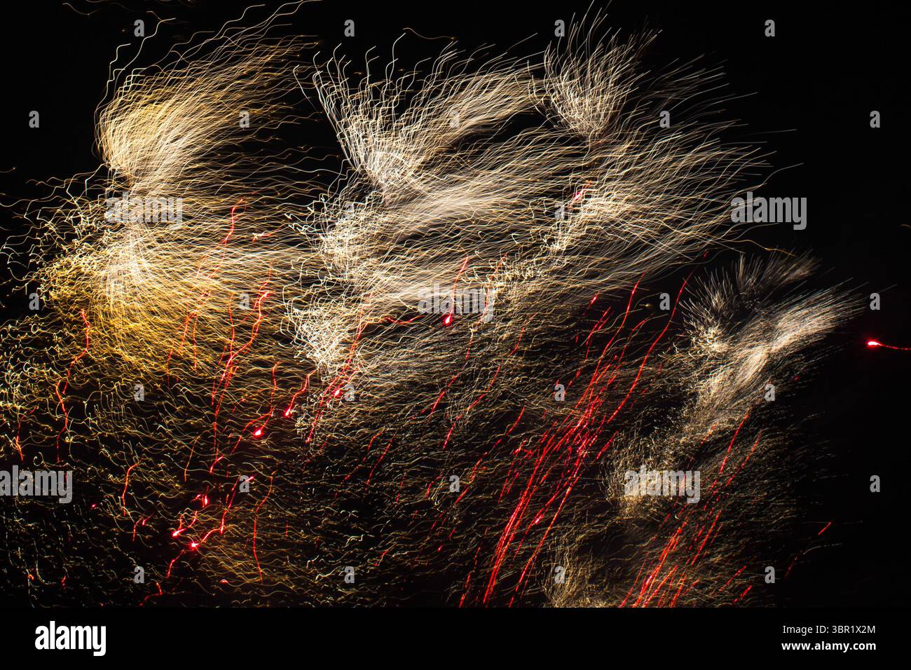 Ornamental fireworks being lit on new years' eve to cellebrate and ...