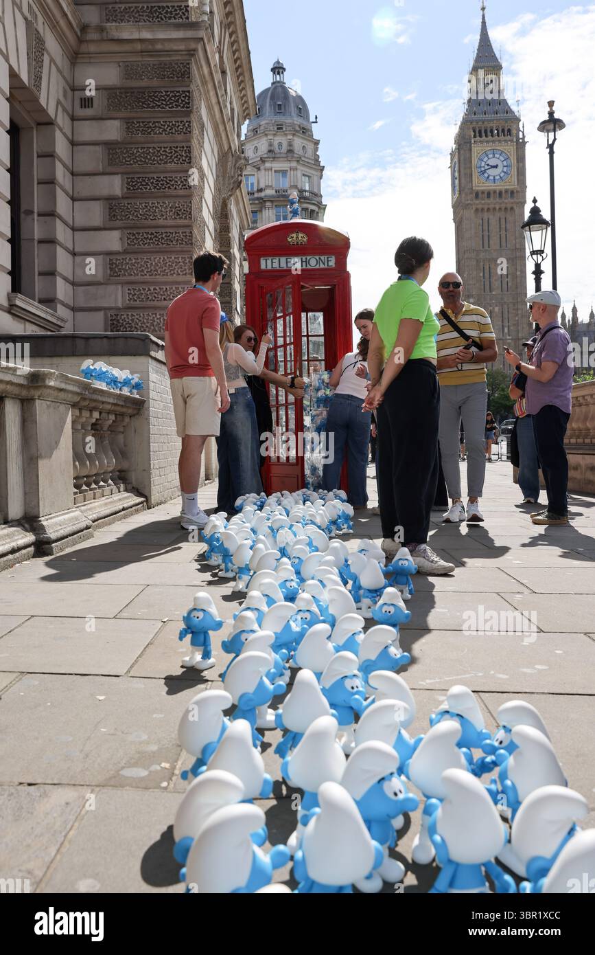 London, UK. 09th July, 2025. People seen near Smurfs marching into the ...
