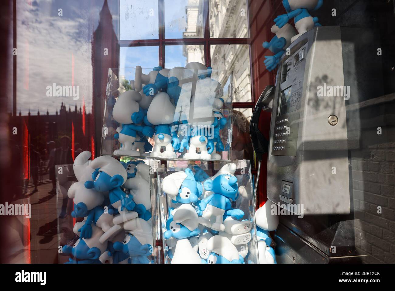 London, UK. 09th July, 2025. Smurfs in a red telephone box in ...