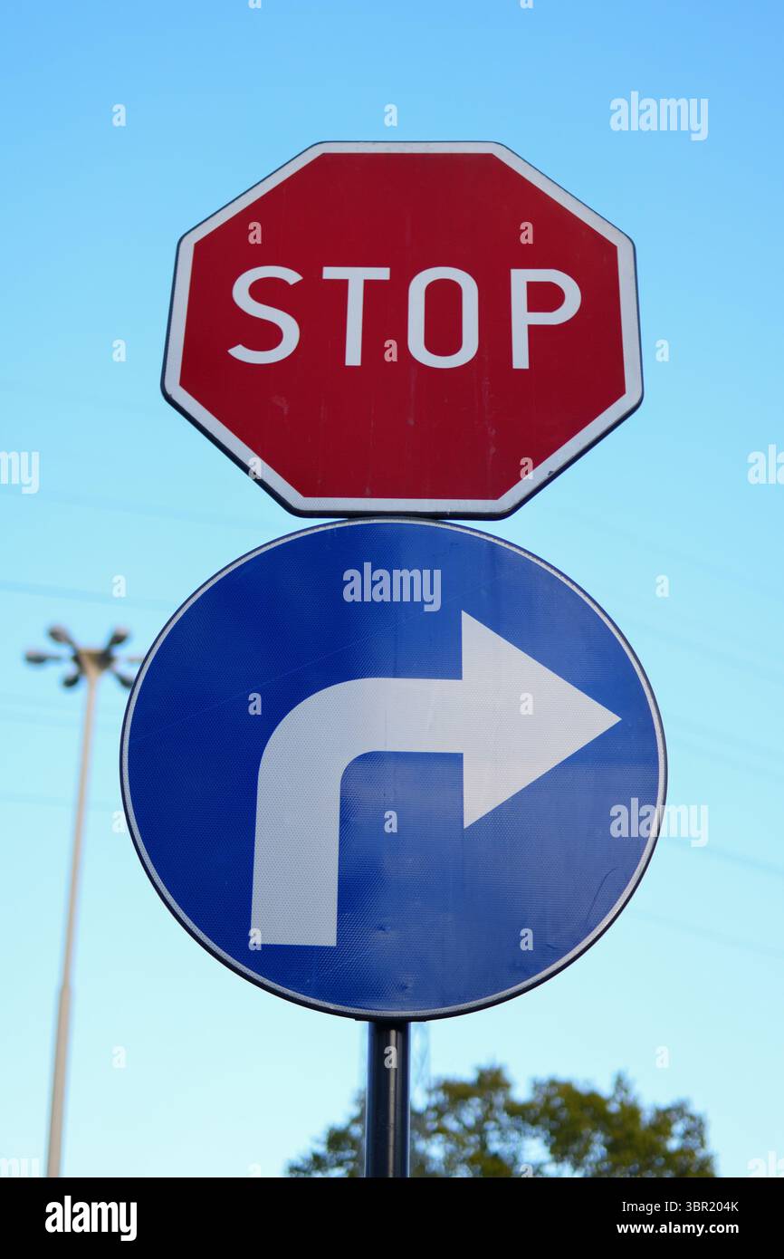 Blue circular road sign hi-res stock photography and images - Alamy