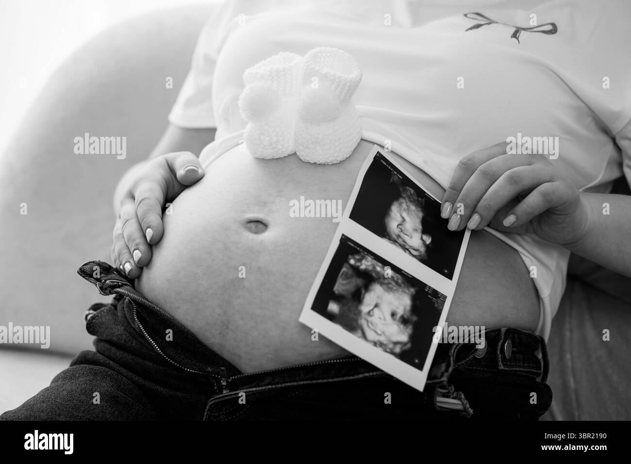 Gentle female hands touching Black and White Stock Photos & Images - Alamy