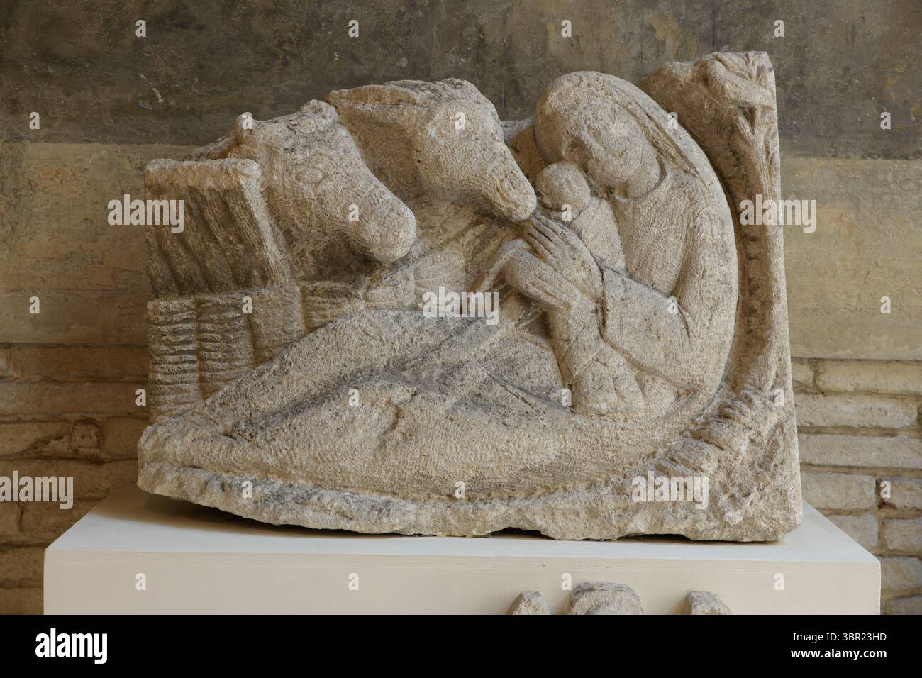 Contemporary stone relief of the Nativity in Romanesque style ...