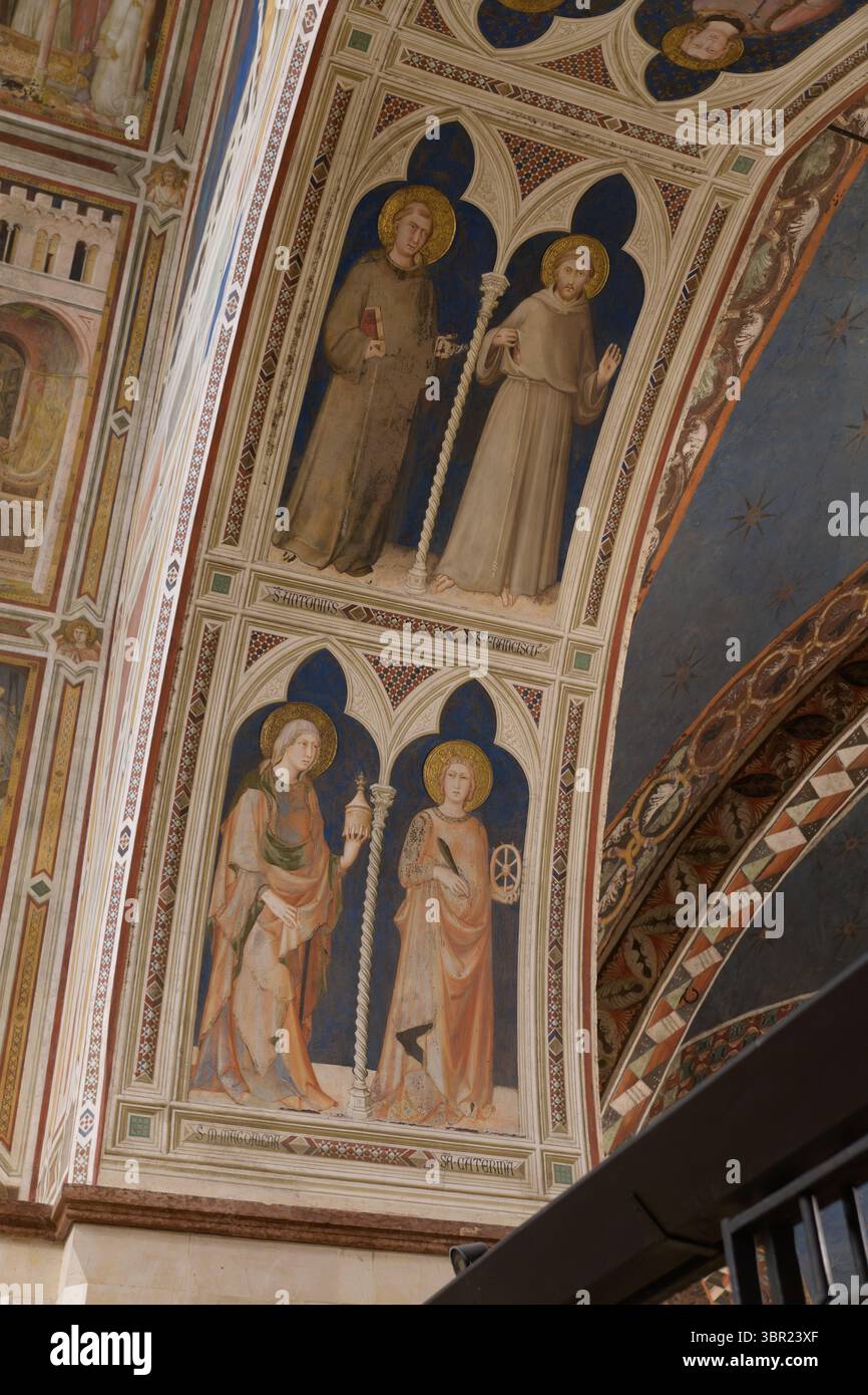 Painted Gothic arch with frescoes by Simone Martini in the Chapel of ...