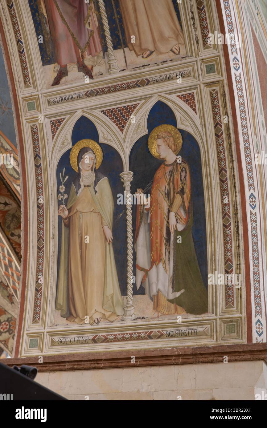 Painted Gothic arch with frescoes by Simone Martini in the Chapel of ...