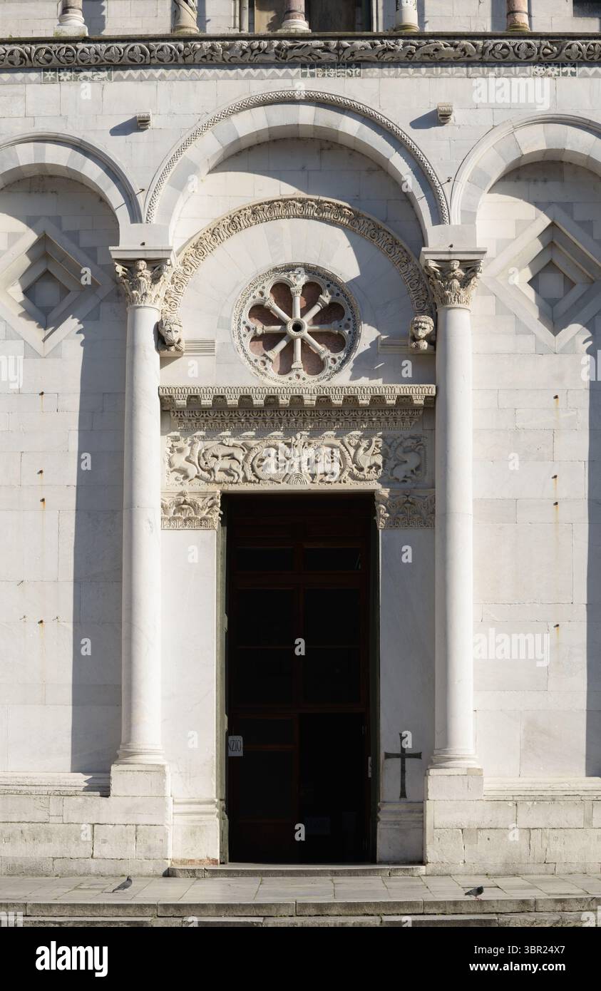 Main portal of San Michele in Foro, Lucca, Italy, with rose window ...