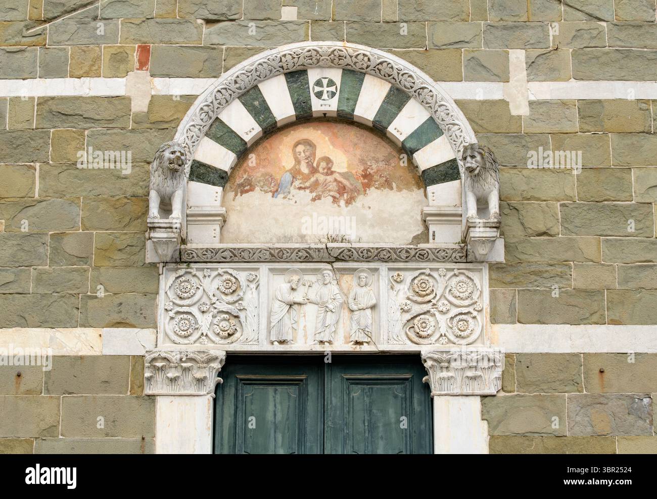 Romanesque marble portal of San Pietro Somaldi in Lucca, Italy, with ...